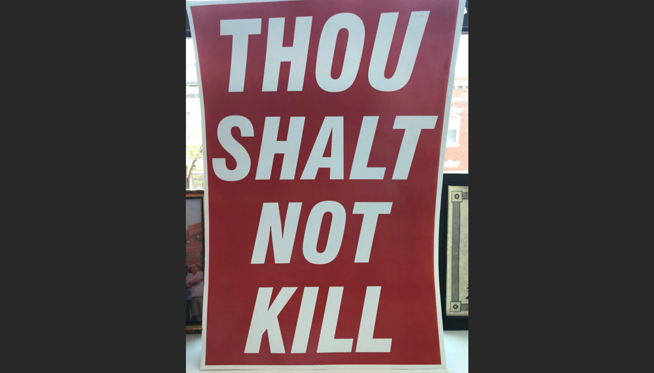 This U.S. city is fighting gun violence with posters that say 'Thou ...