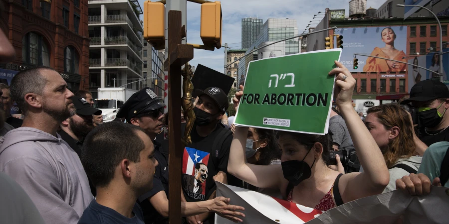 Abortion-protesting priest faces possible prison time after charges ...